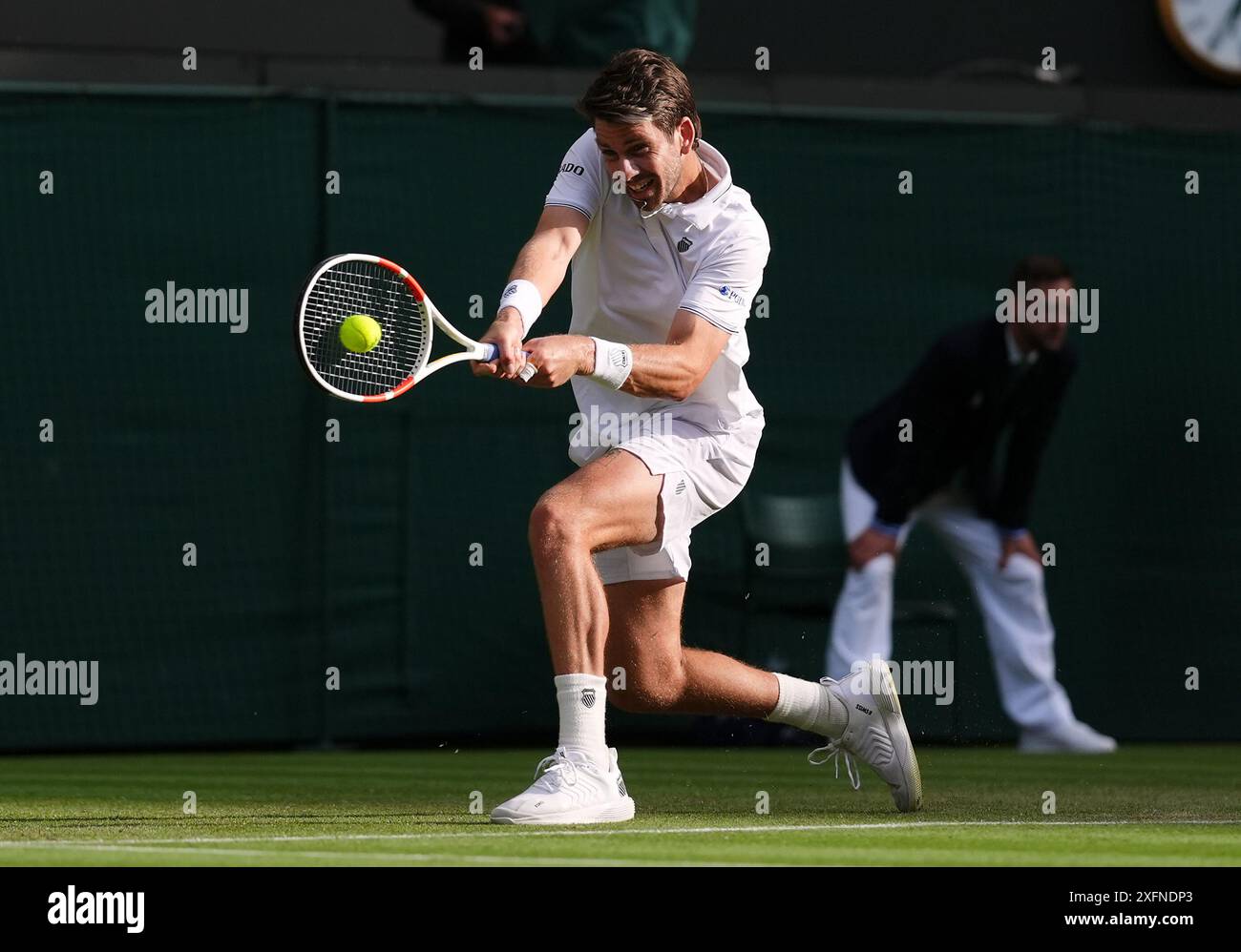 Cameron Norrie in action against Jack Draper (not pictured) on day four ...