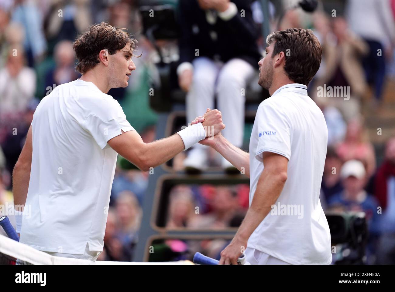 Jack Draper (left) and Cameron Norrie shake hands after their match on ...