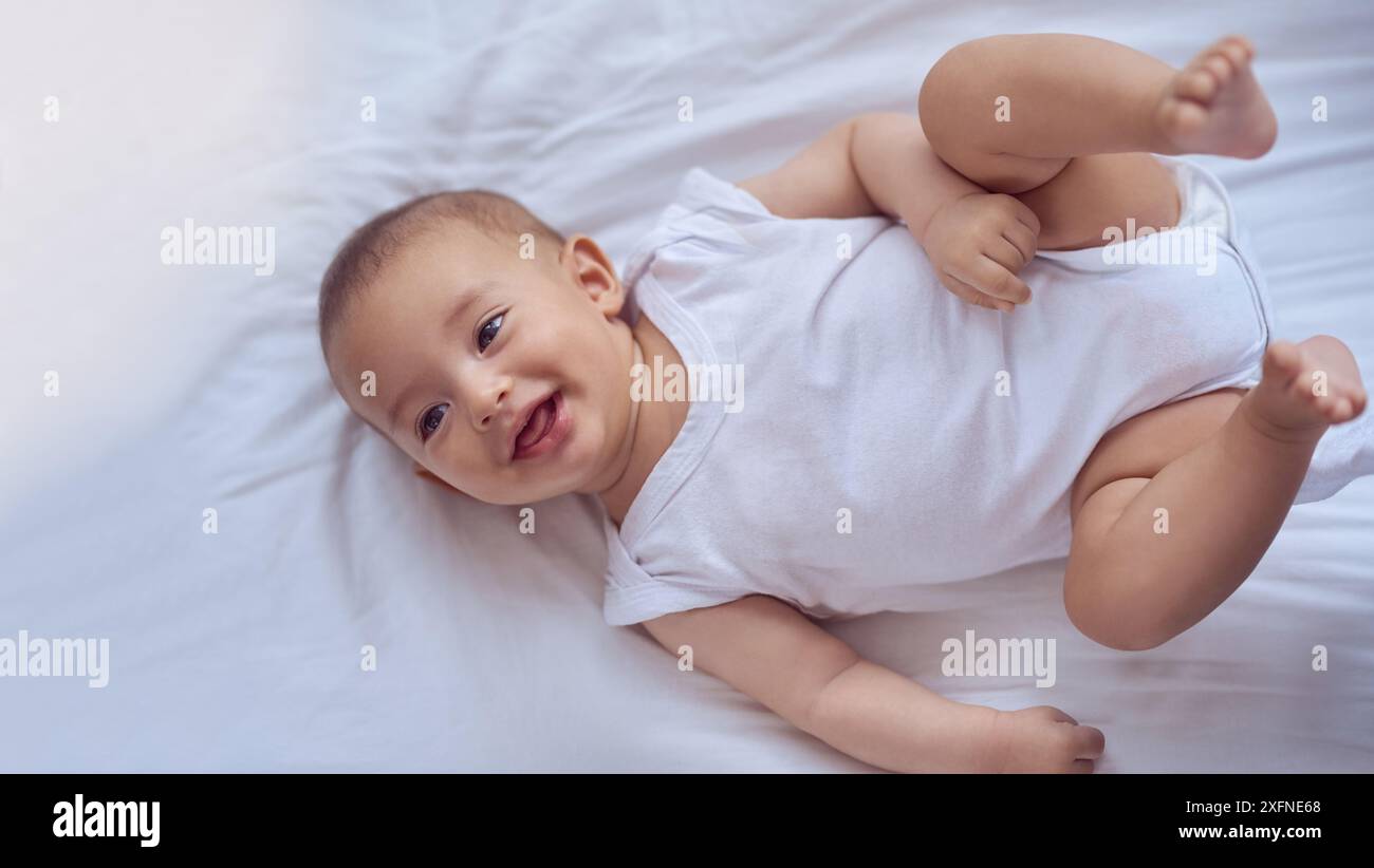 Newborn, baby and face in bed with relax for wellness, healthy ...