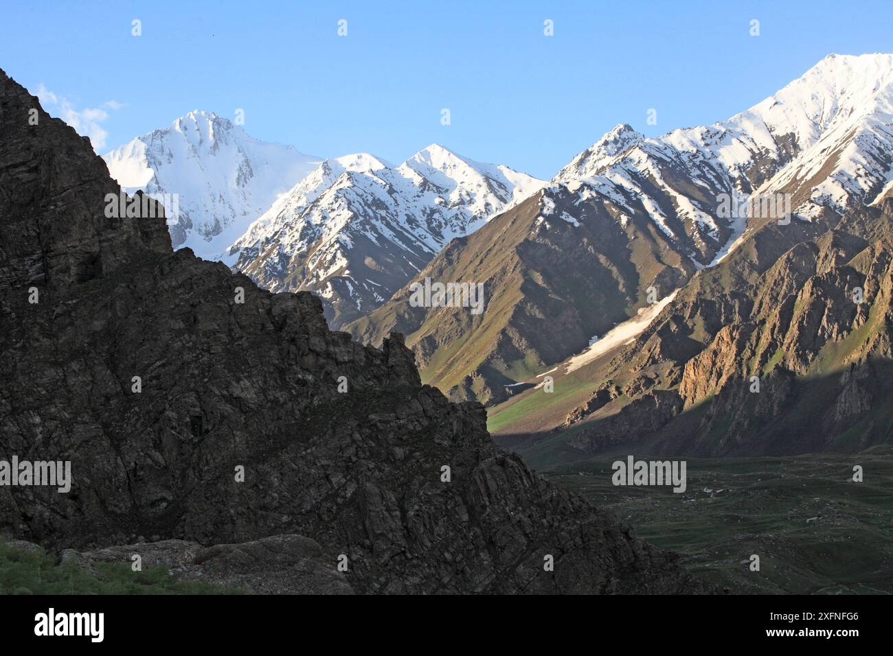 Higlands of Pamir Mountains with alpine pastures and glaciers. Central ...