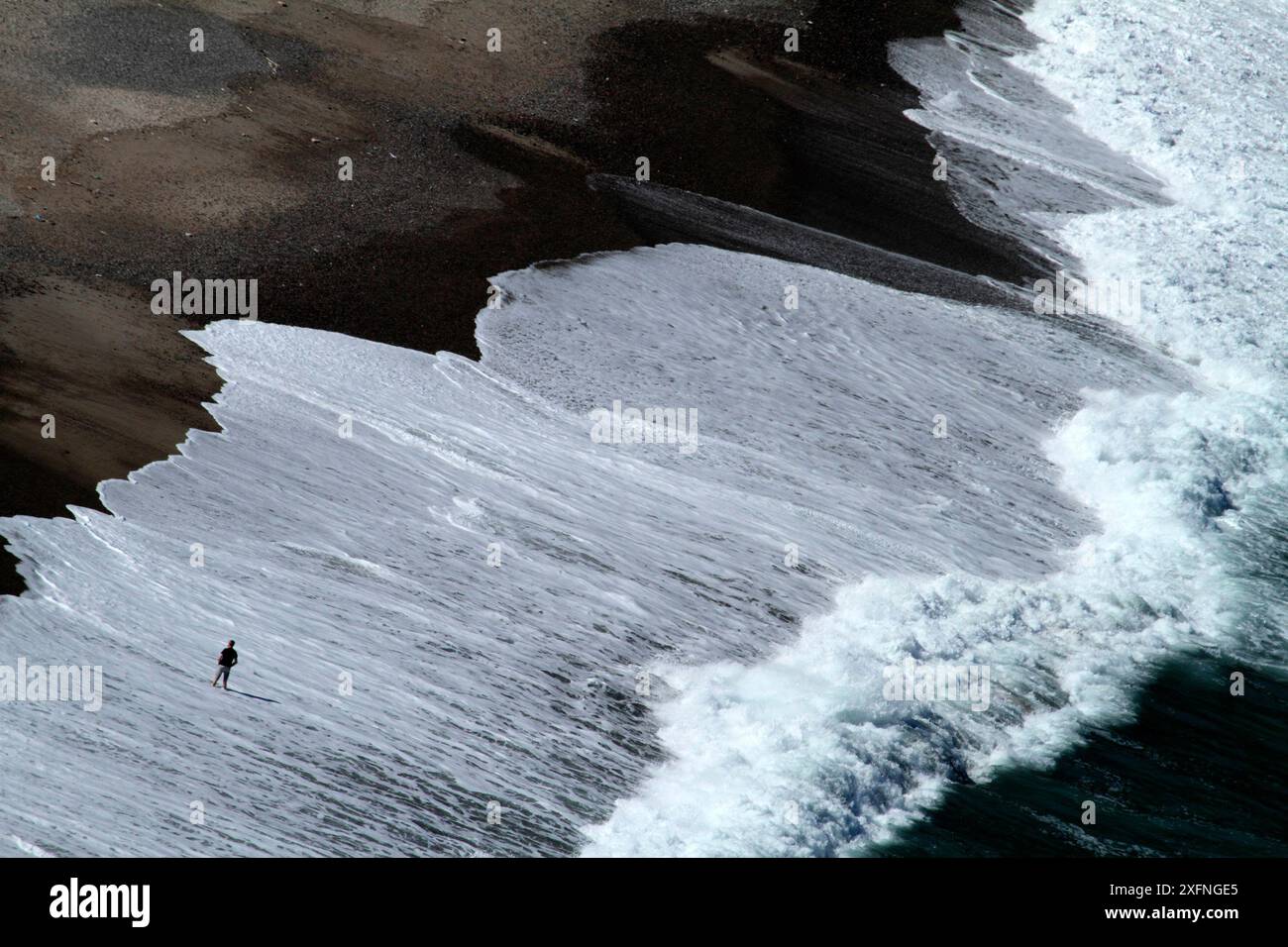 Man on the beach in the gulf of Porto, see from above, UNESCO World ...