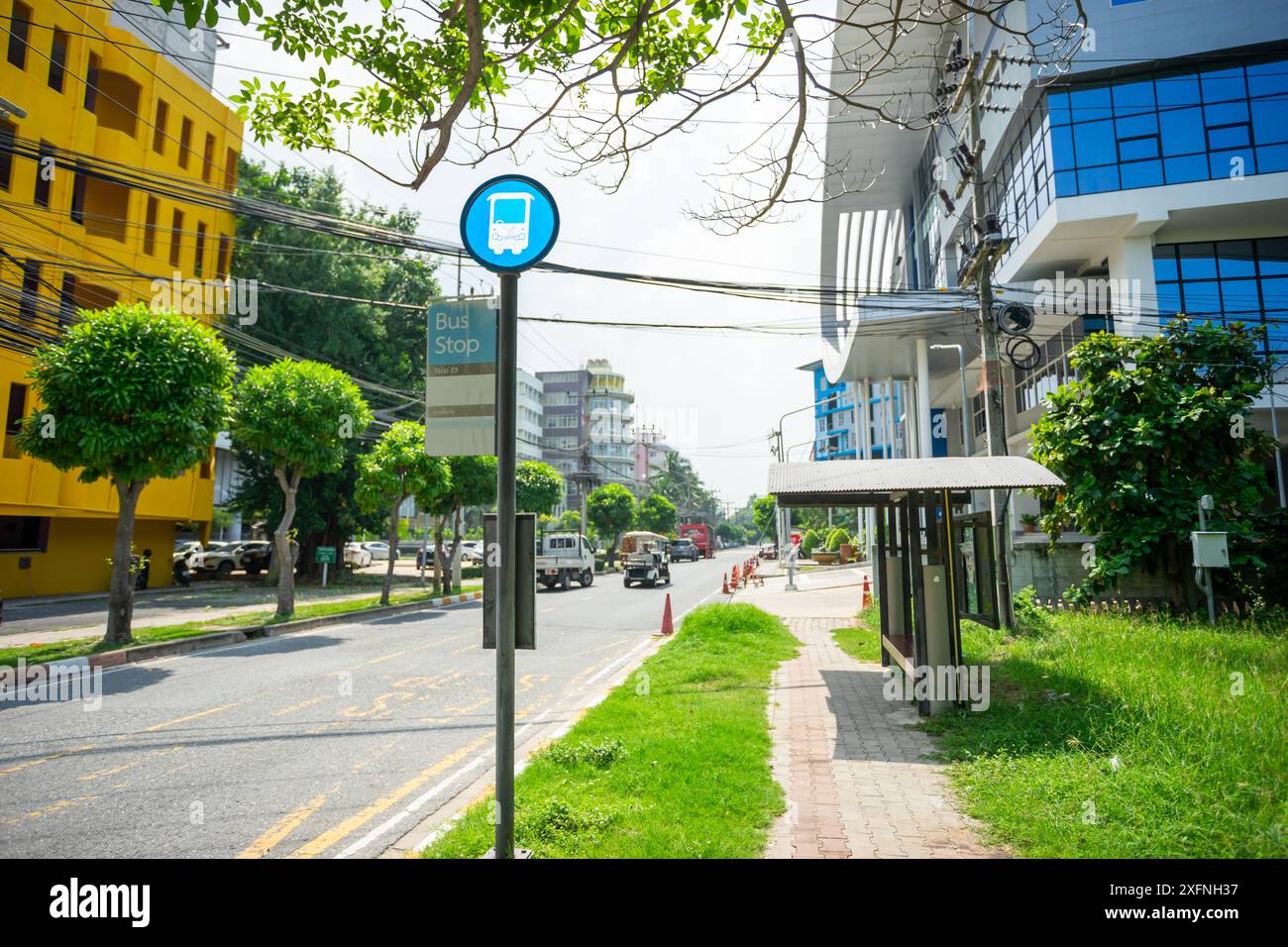 A stock photo of a bus stop typically features an image of a bus stop ...