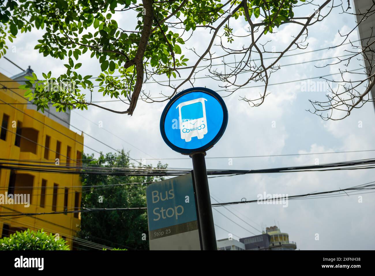 A stock photo of a bus stop typically features an image of a bus stop ...