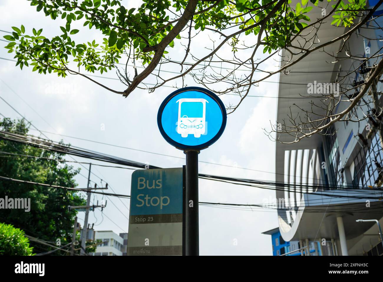 A stock photo of a bus stop typically features an image of a bus stop ...