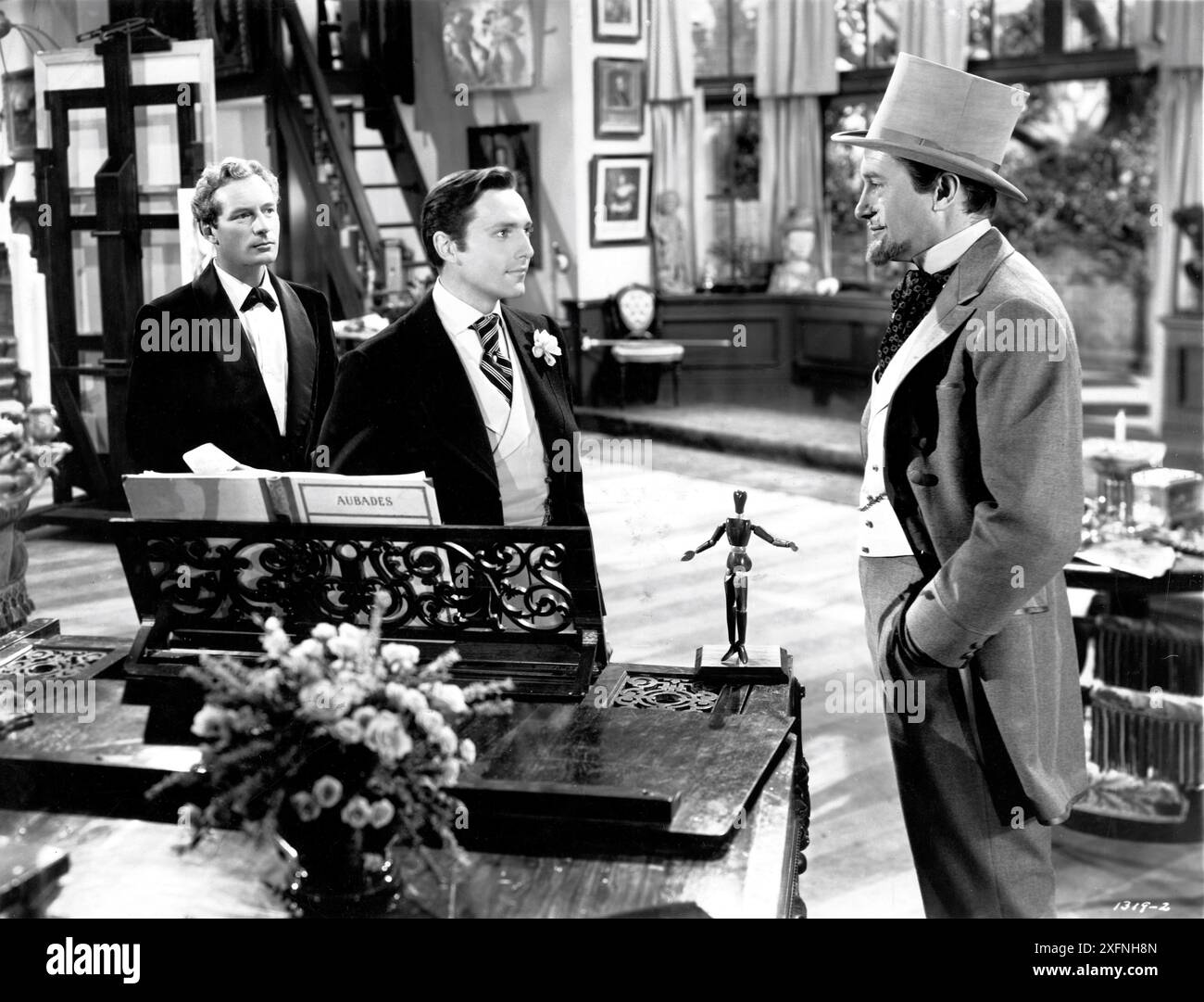 LOWELL GILMORE as Basil Hallward HURD HATFIELD as Dorian Gray and GEORGE SANDERS as Lord Henry ...