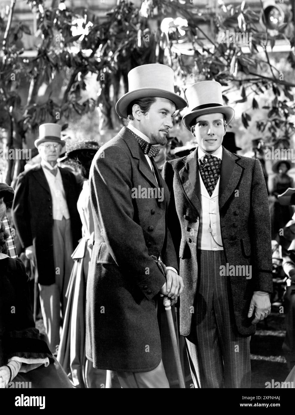 GORGE SANDERS as Lord Henry Wotton and HURD HATFIELD as Dorian Gray in ...