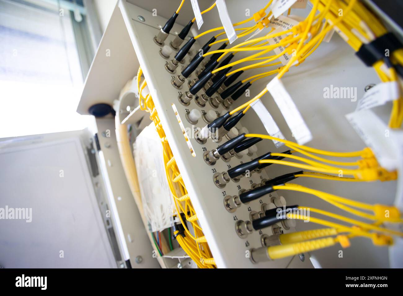 fiber optic with servers in a technology data center Stock Photo - Alamy