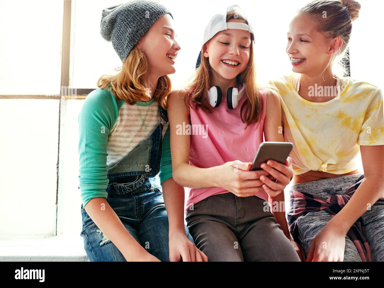 Girl friends, teen people and phone for social media post, happy smile ...