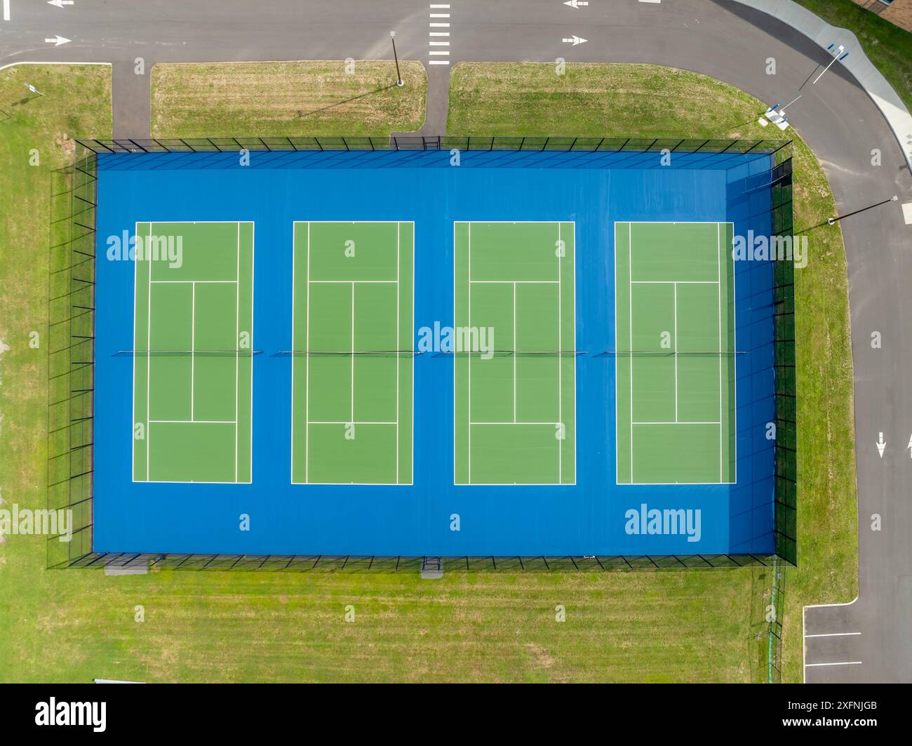 Aerial, drone, photo of new outdoor green tennis courts with white ...