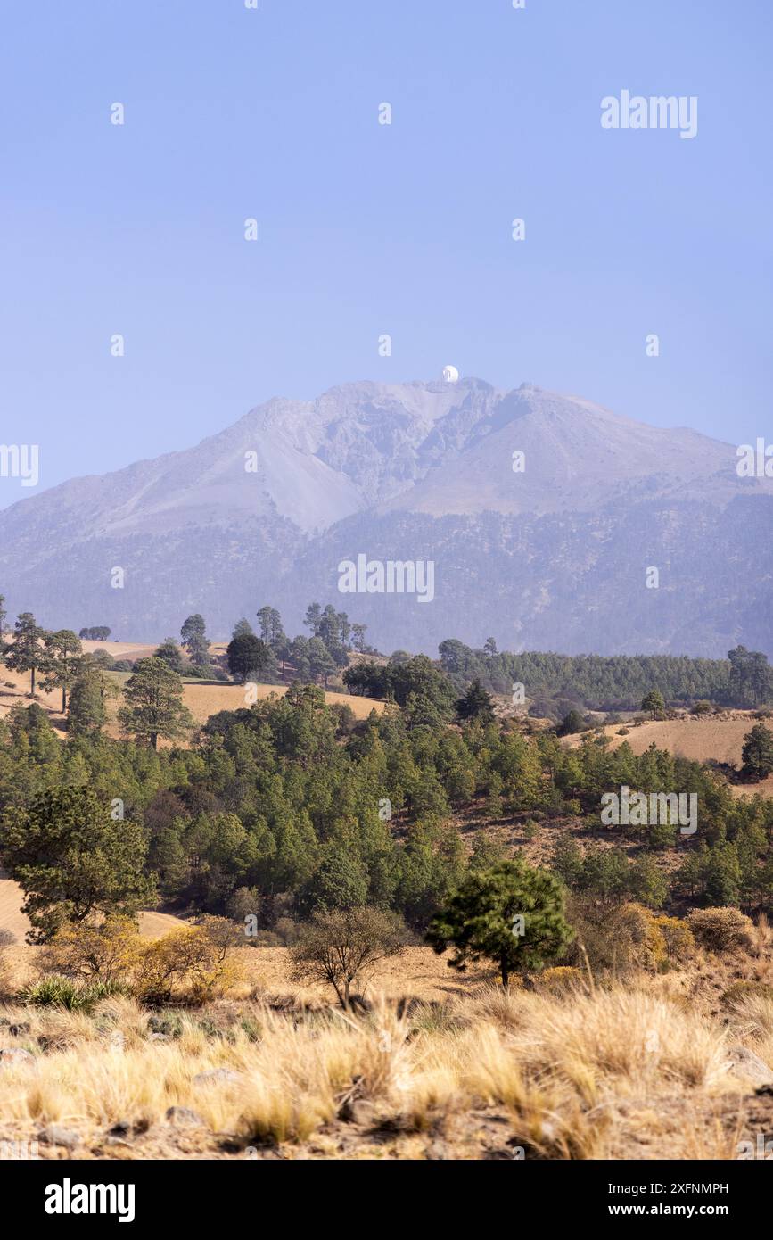 Distant view of the Large Millimeter radio telescope on top of Sierra ...