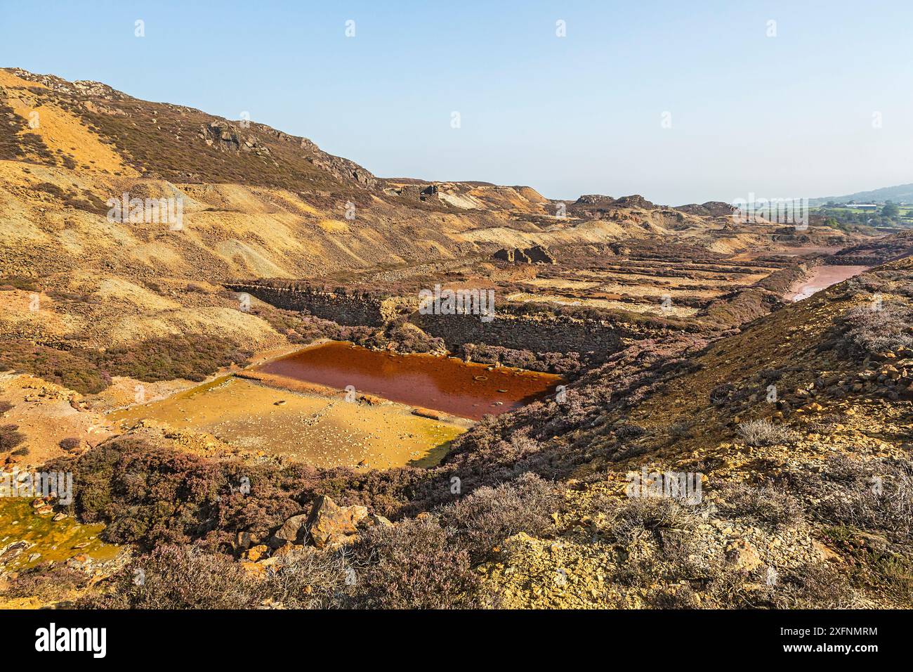 Parys Mountain disused copper ore mine showing precipitation ponds ...