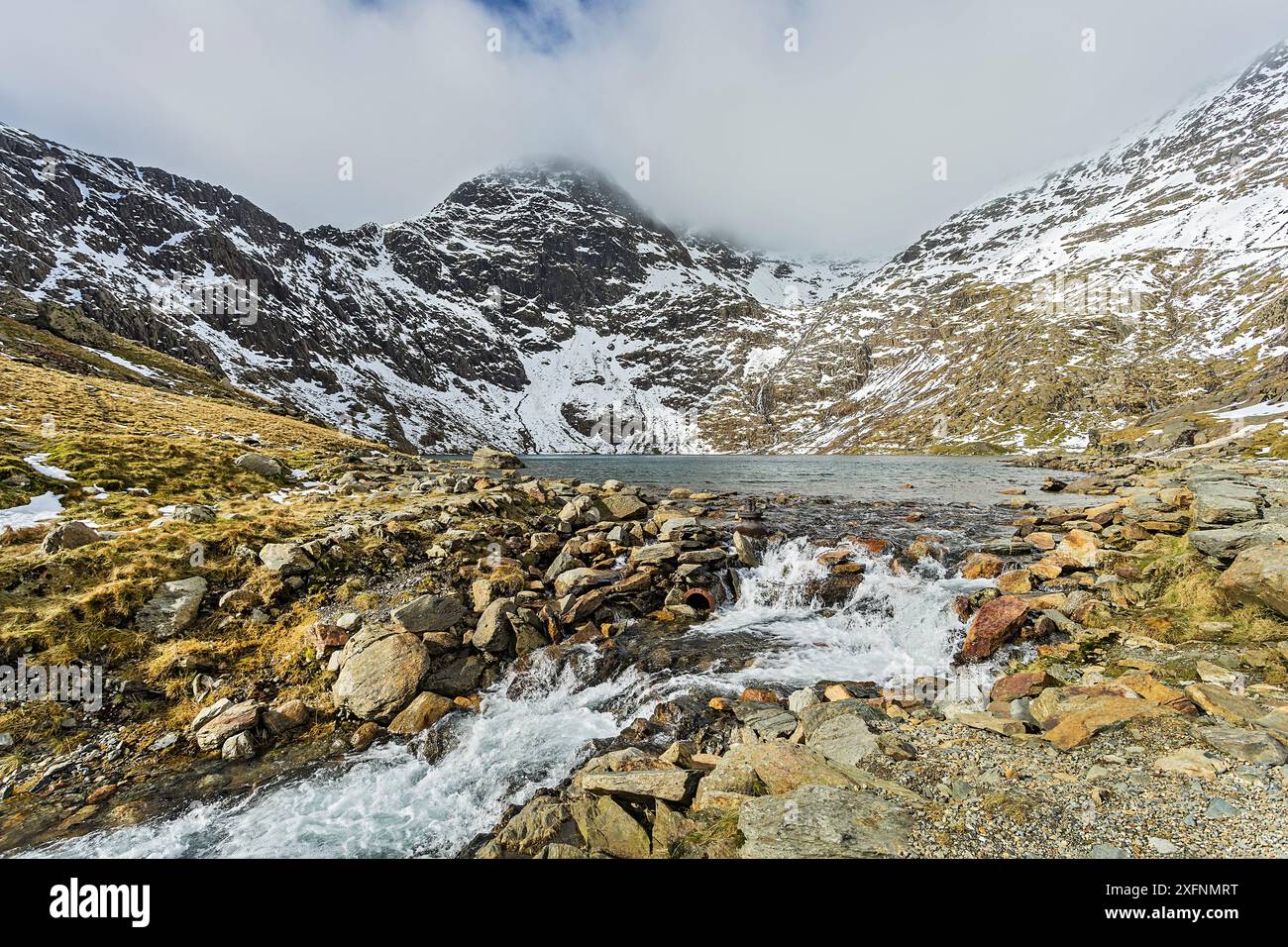 Lake Glaslyn showing the outflow the source of the Afon (River) Glaslyn ...