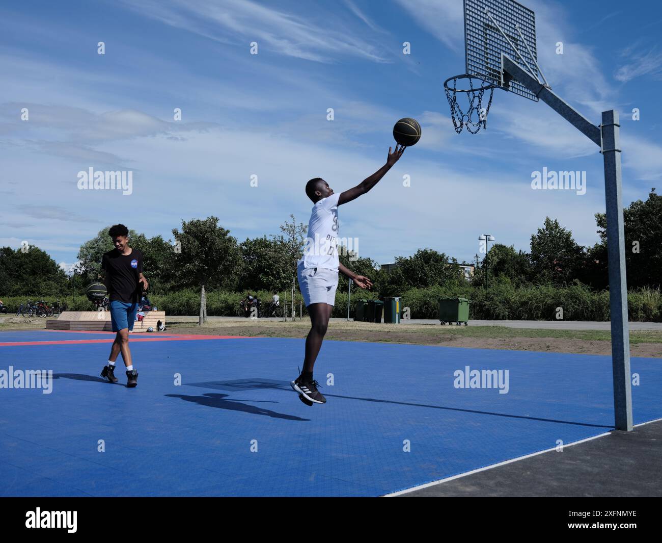 Men playing basketball at the beach in Malmö, Sweden Stock Photo - Alamy