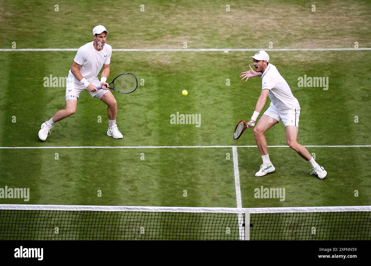 Andy Murray (left) and Jamie Murray in action during their gentlemen's ...