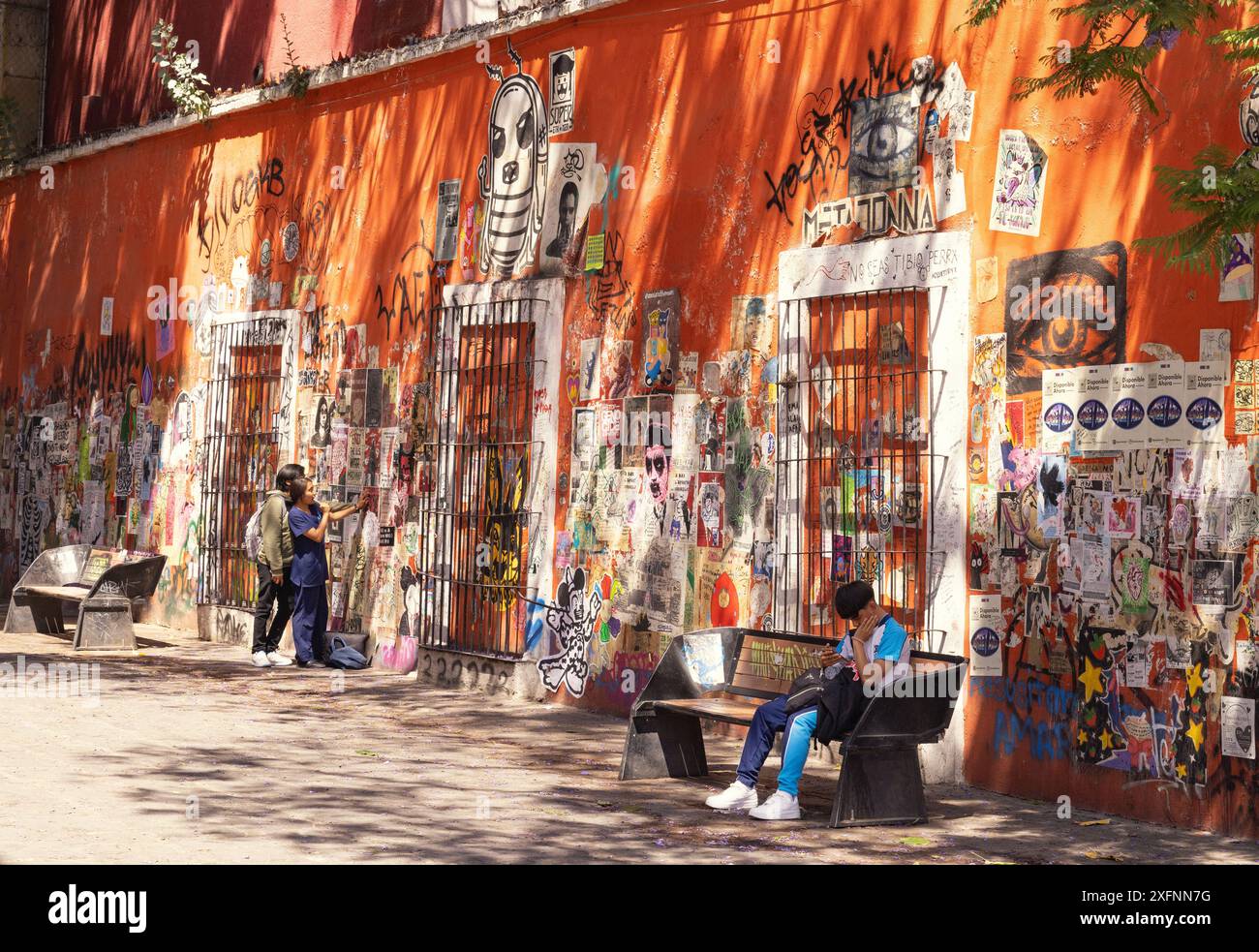 People in a colorful street scene in a neighborhood near the city ...