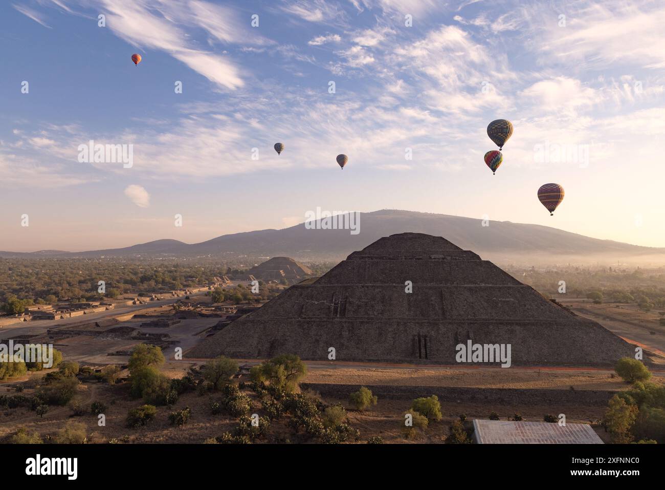 Mexico tourism - Hot air balloons ballooning over the Pyramids of the ...