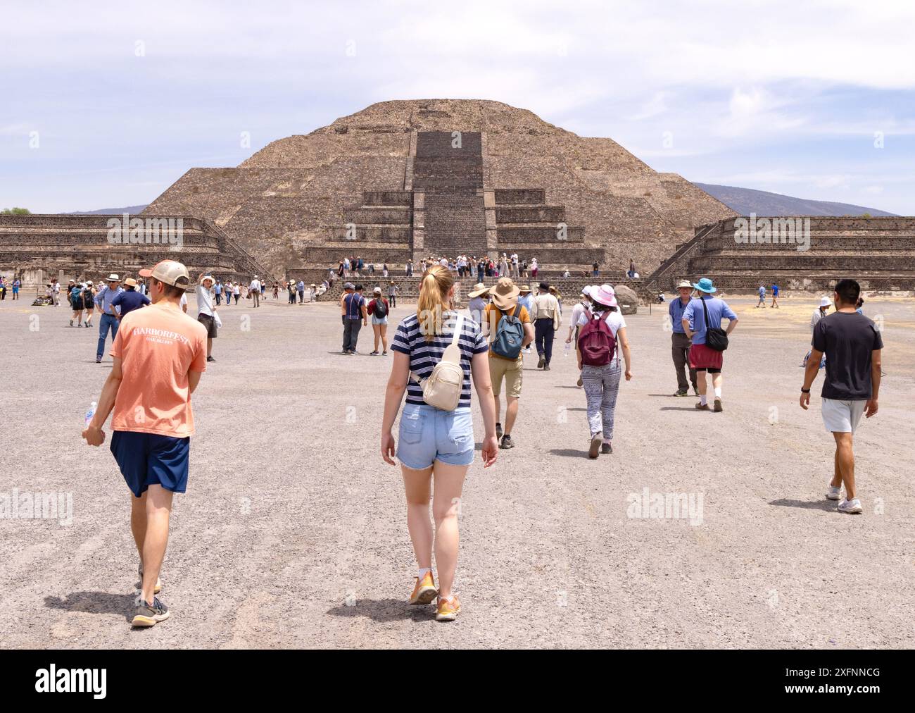 Mexico tourists; People in Teotihuacan, walking towards the Pyramid of ...