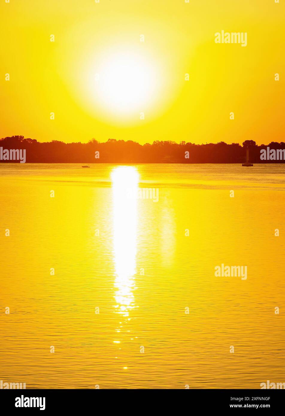 Golden Glow Sunrise shimmering over Detroit River south Stock Photo - Alamy