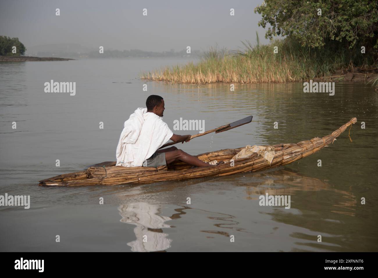 Monk crossing Lake Tana, source of the Blue Nile, from Debra Mariam ...