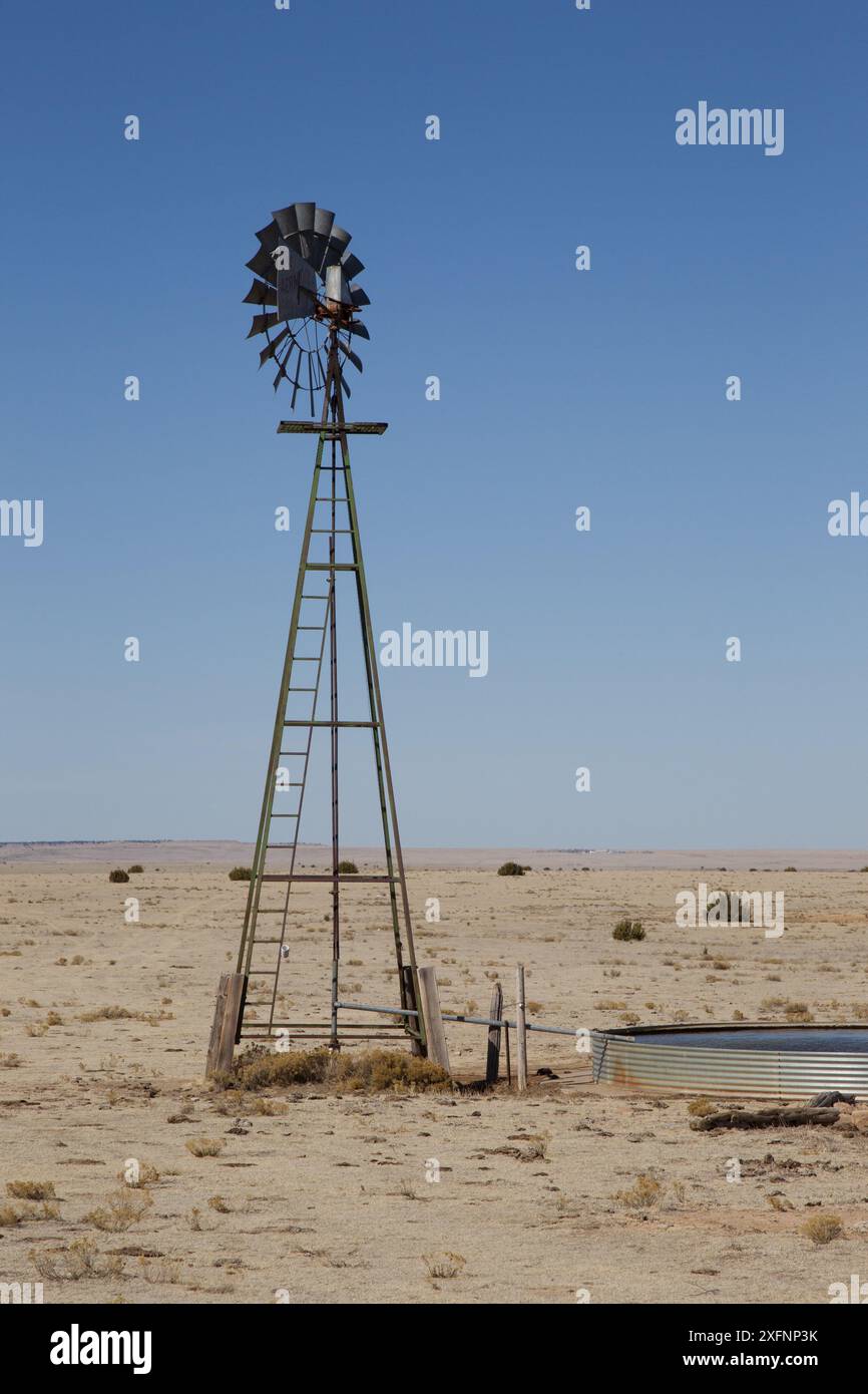 Water pump wind mill with pipe to stock watering tank, south of Lamar ...