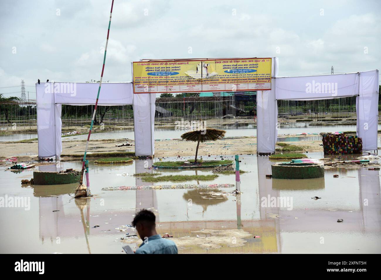 HATHRAS, INDIA - JULY 4: People looking towards the pandal at the spot ...