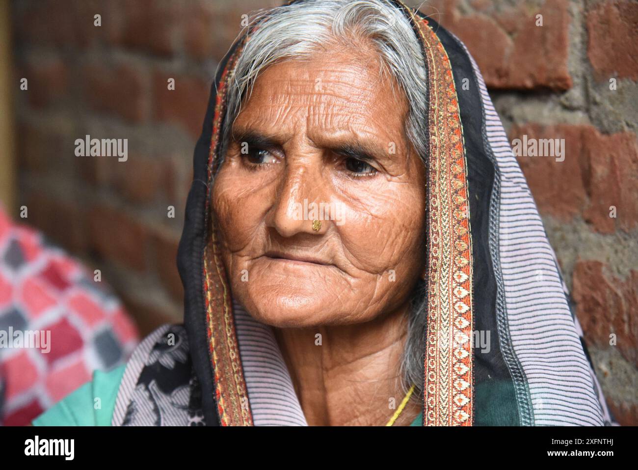 HATHRAS, INDIA - JULY 4: family members are saddened by the death of ...
