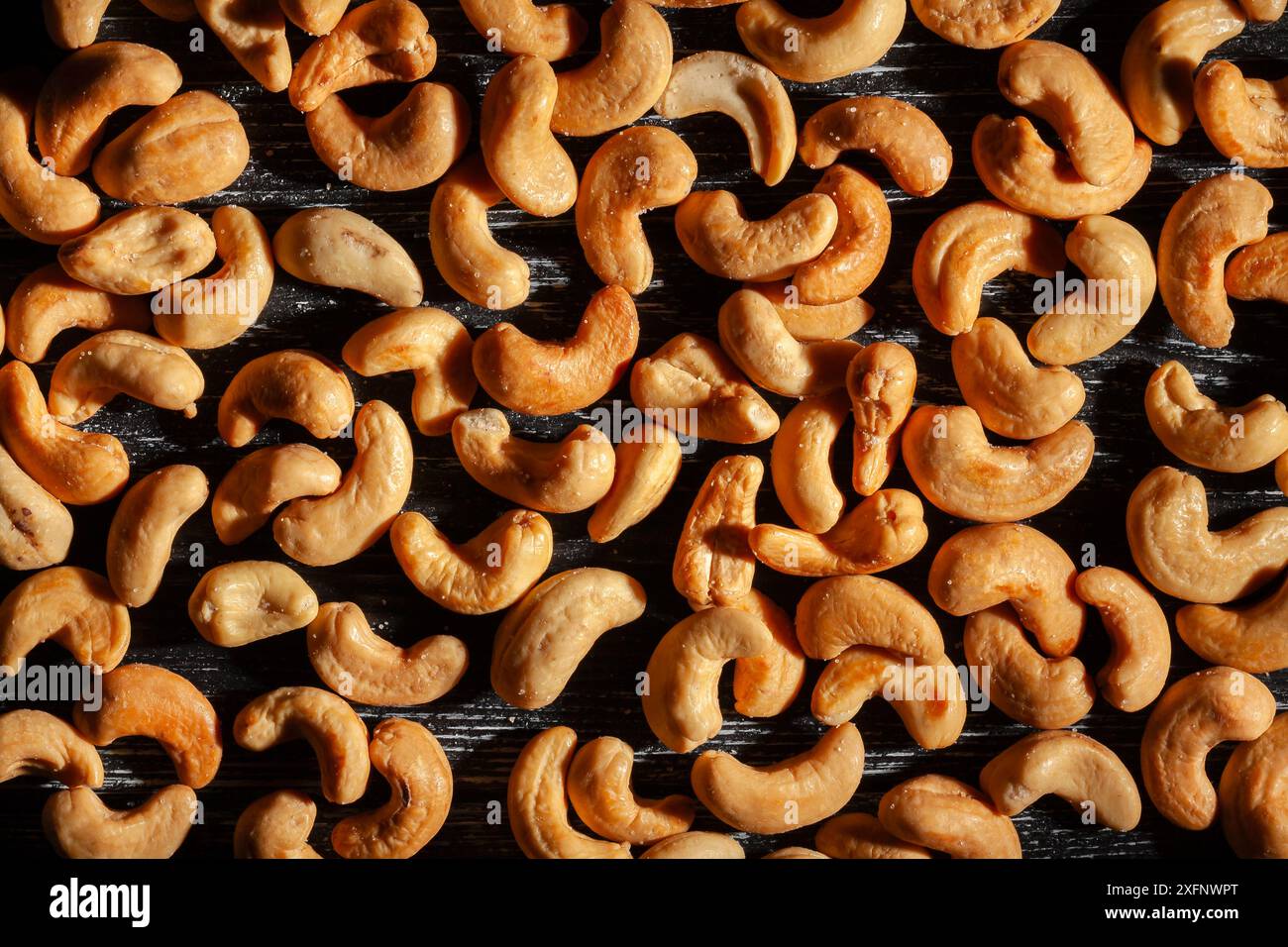 cashew nuts pattern texture on wood background top view Stock Photo - Alamy