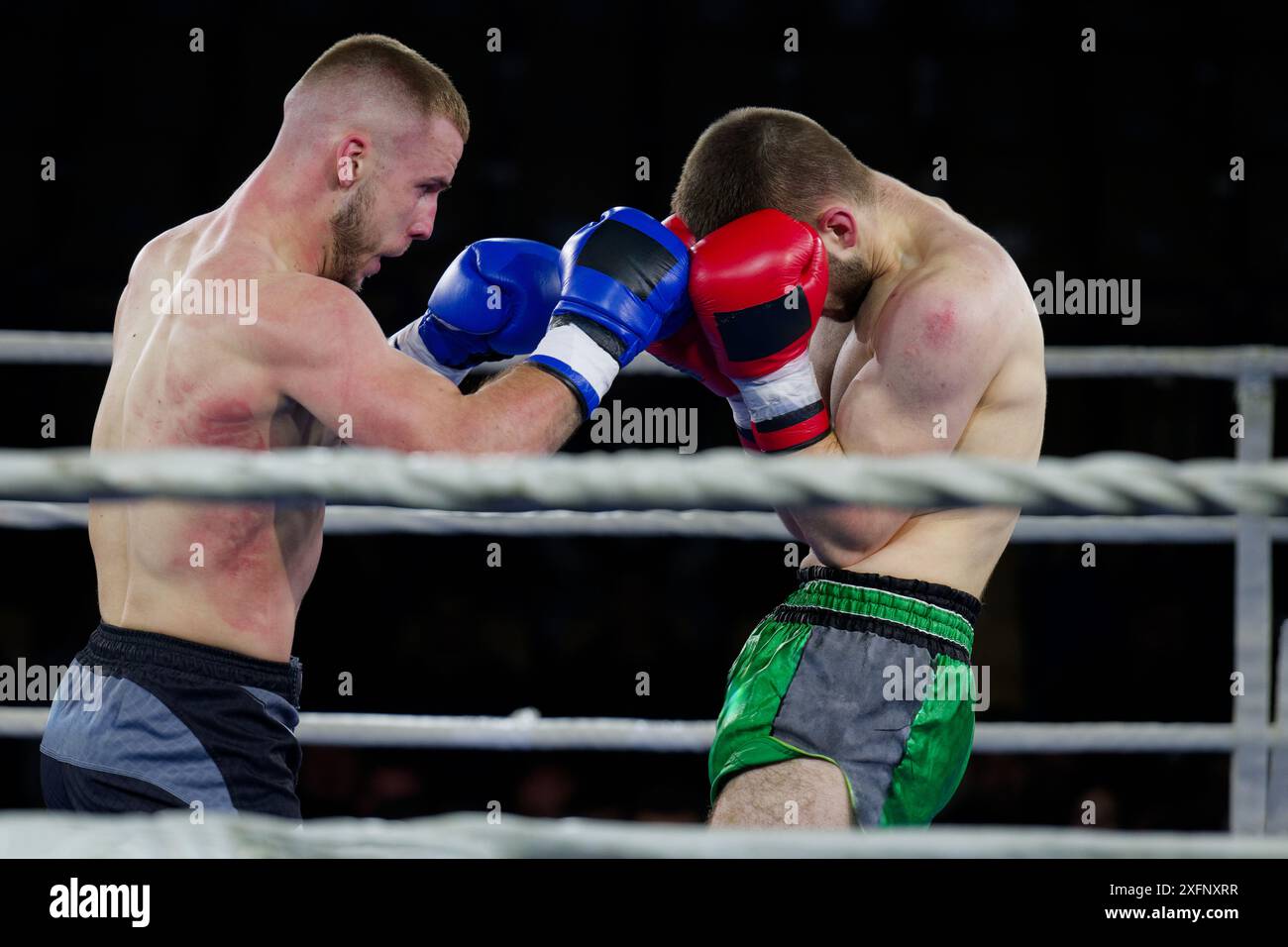 Fierce boxing match showcases athletes' power and skill Stock Photo - Alamy