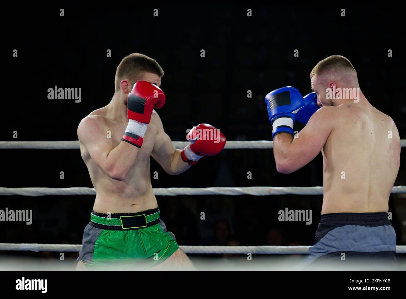 Fierce boxing match showcases athletes' power and skill Stock Photo - Alamy
