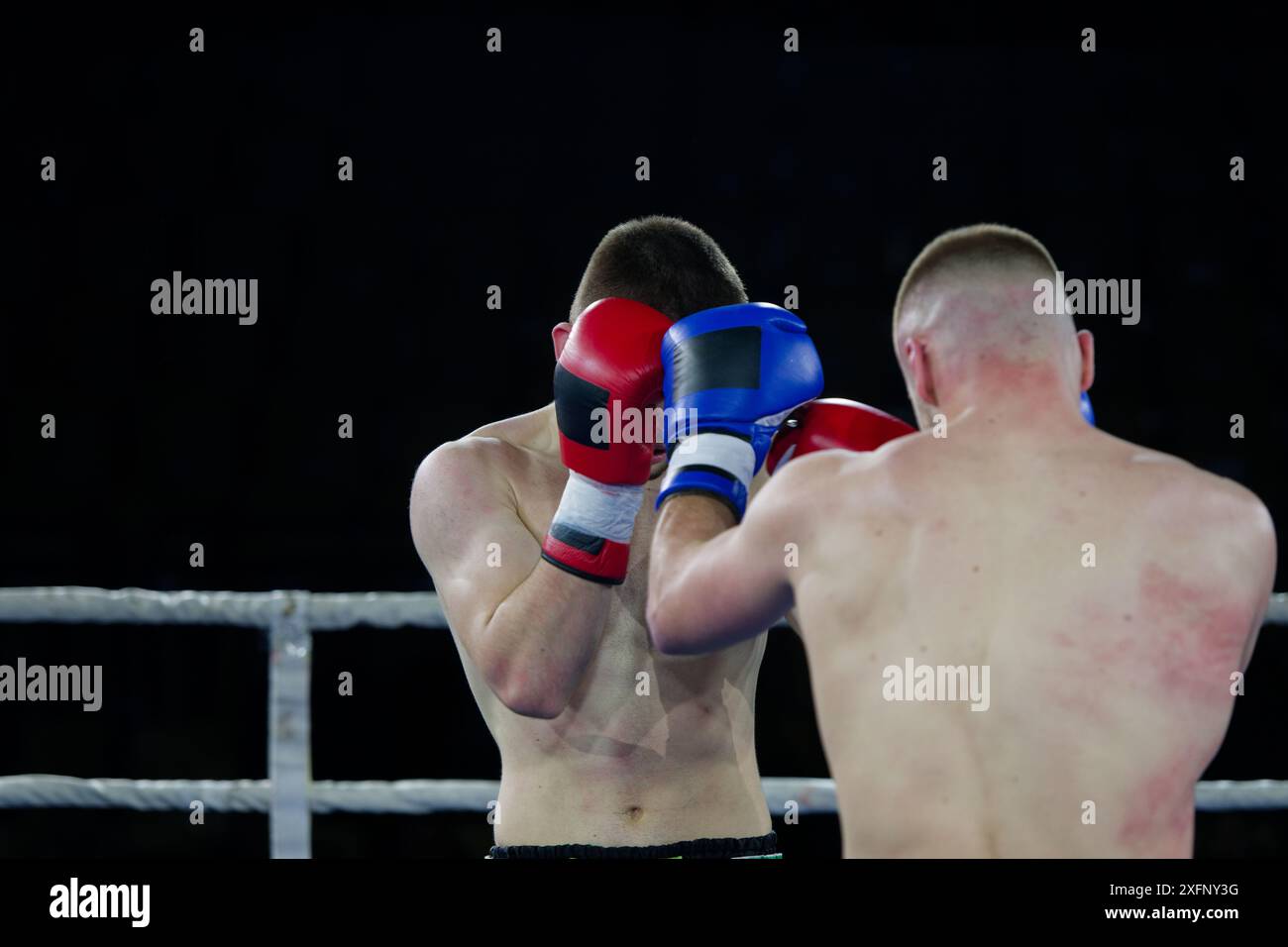 Fierce boxing match showcases athletes' power and skill Stock Photo - Alamy