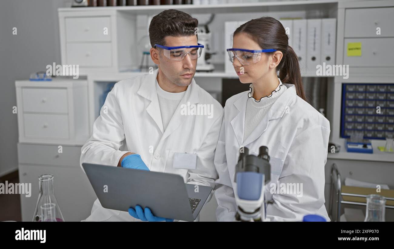 Scientists using modern computer technology hi-res stock photography ...