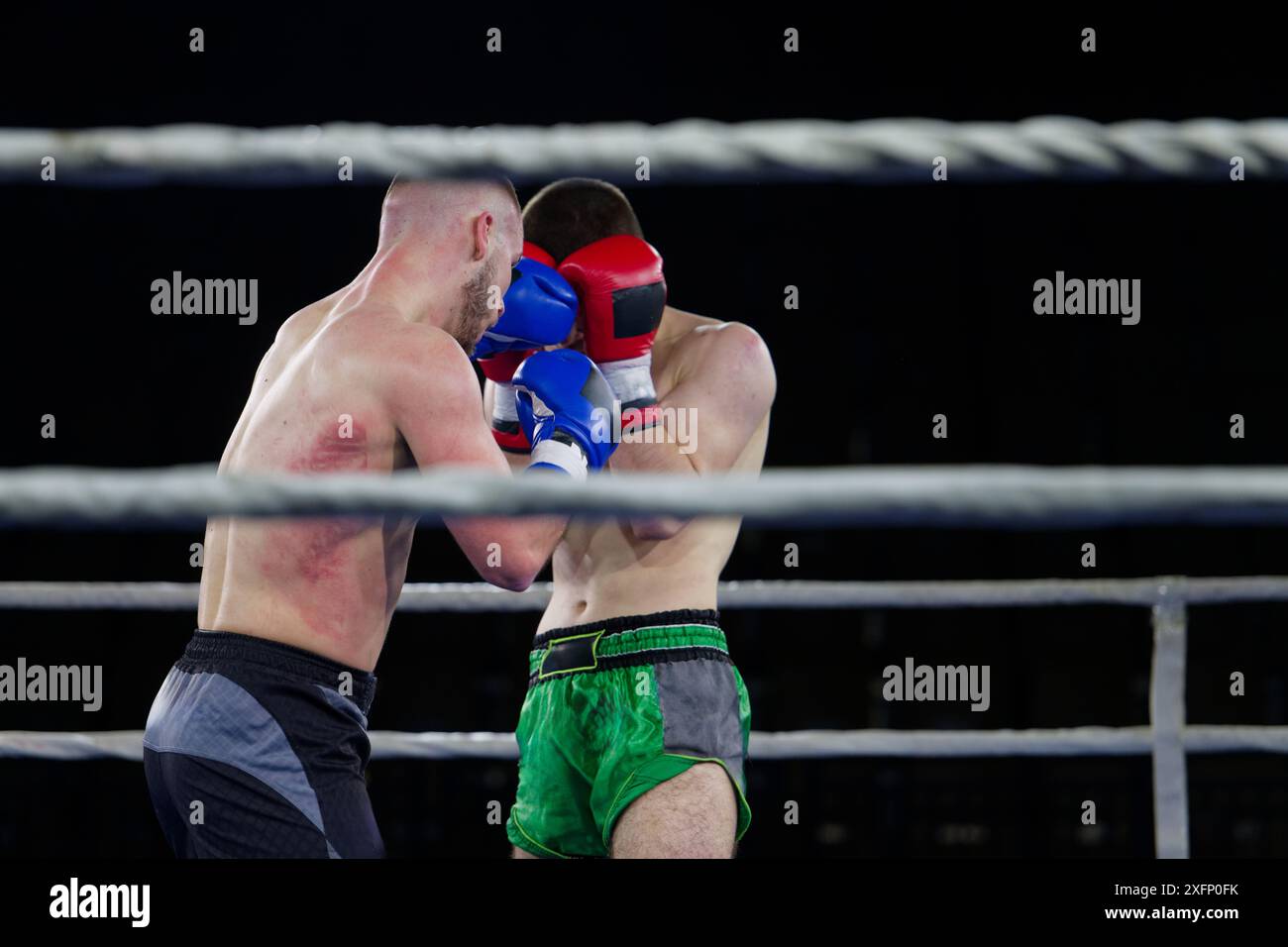 Fierce boxing match showcases athletes' power and skill Stock Photo - Alamy