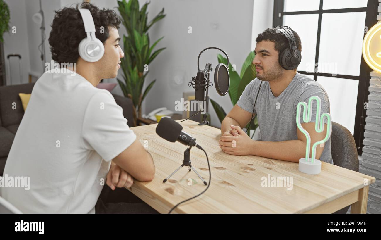 Two men recording podcast hi-res stock photography and images - Alamy