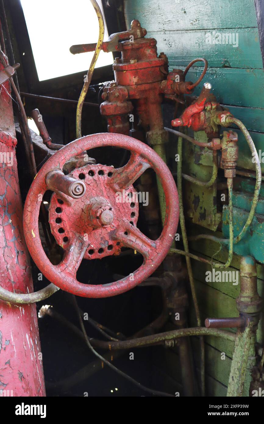 Vertical photo Steam engine controls. Fragment of the driver's cabin of ...