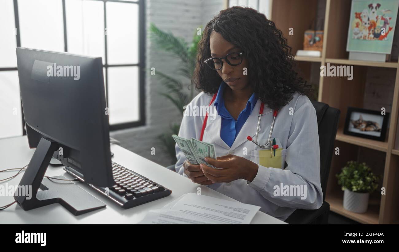 Young african american woman in a clinic counting money while wearing a ...