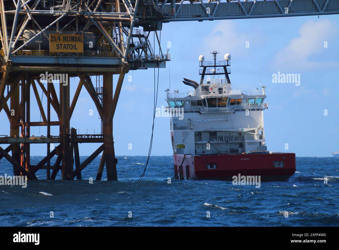 'Heimdal' oil production platform with Platform supply vessel North Sea ...