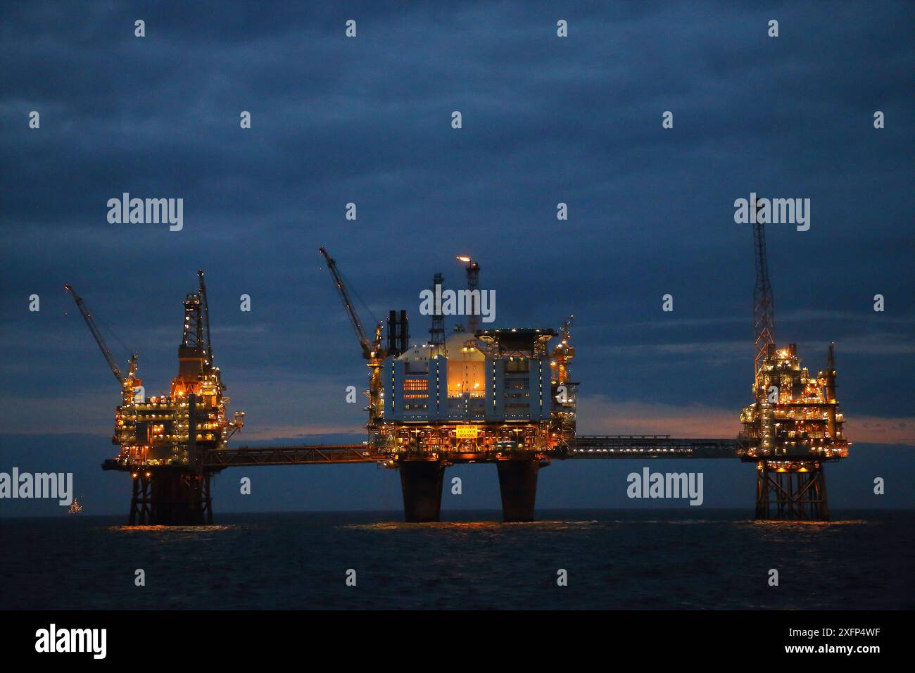 Oseberg central oil production platform at dusk, North Sea, June 2016 ...