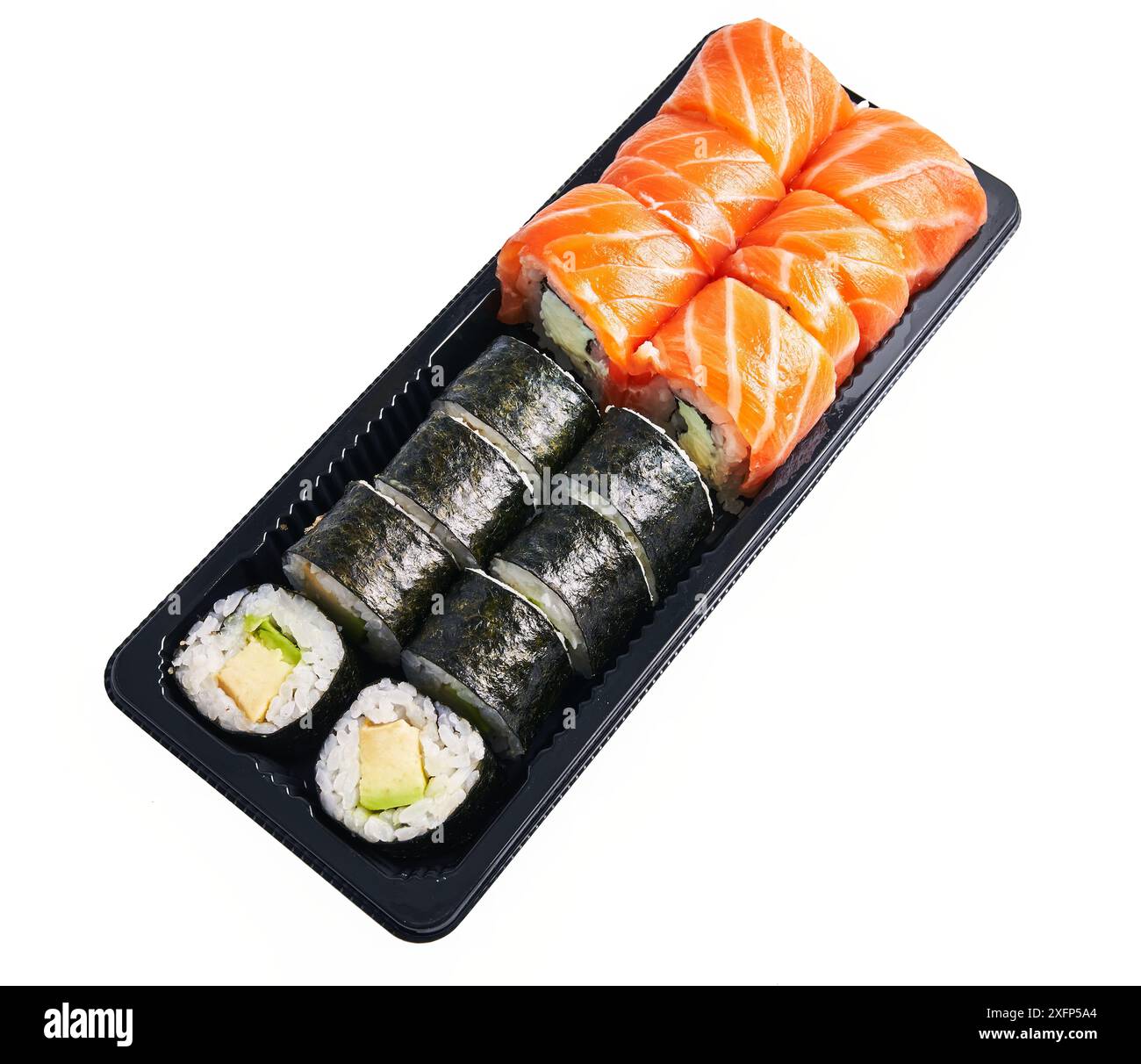 A sushi platter featuring nigiri and maki rolls on a black tray ...