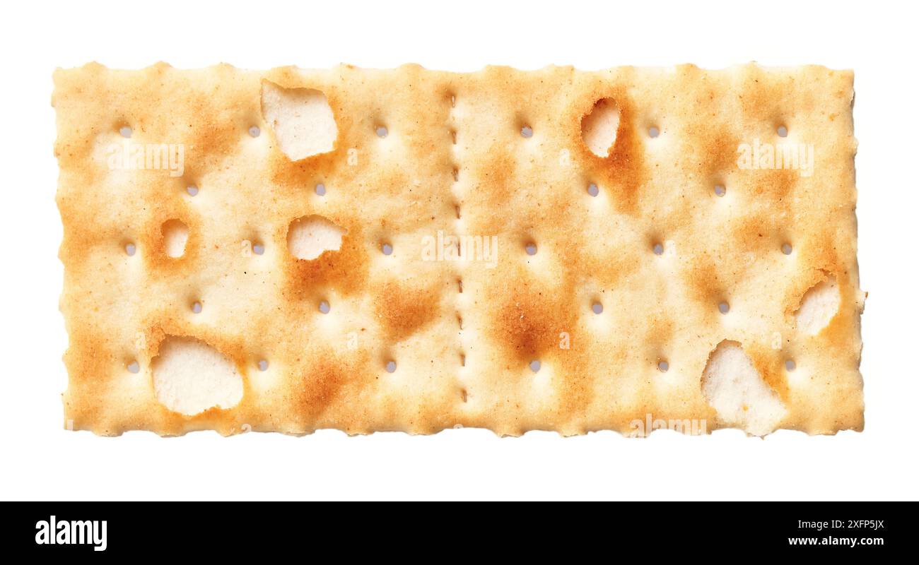 Close-up of a single golden-brown cracker isolated on white background ...
