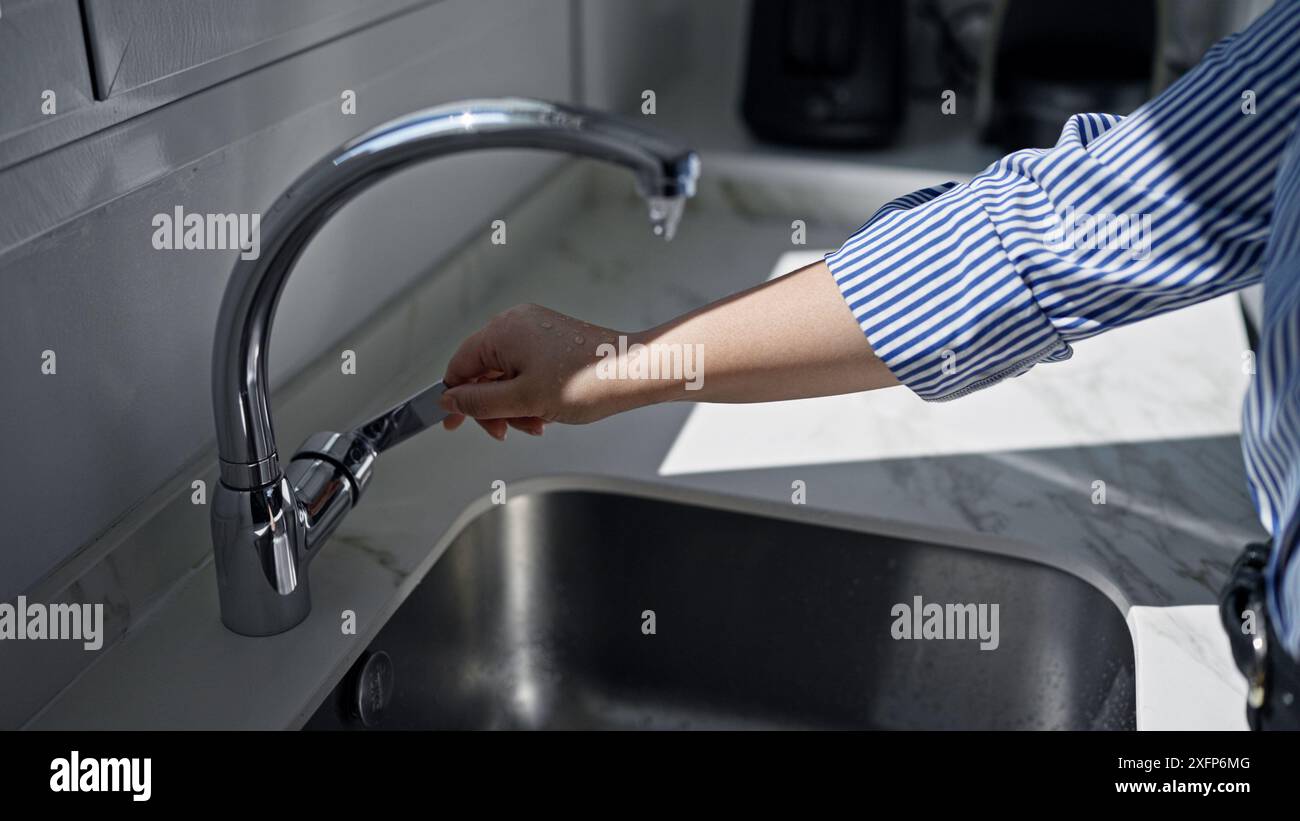 Hand closing tap hi-res stock photography and images - Alamy
