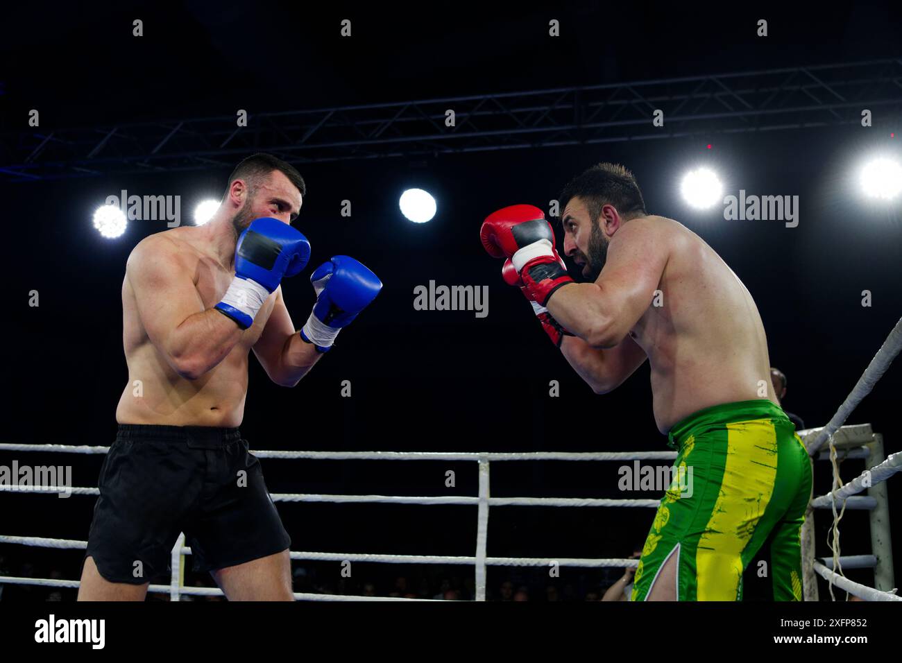 Fierce boxing match showcases athletes' power and skill Stock Photo - Alamy