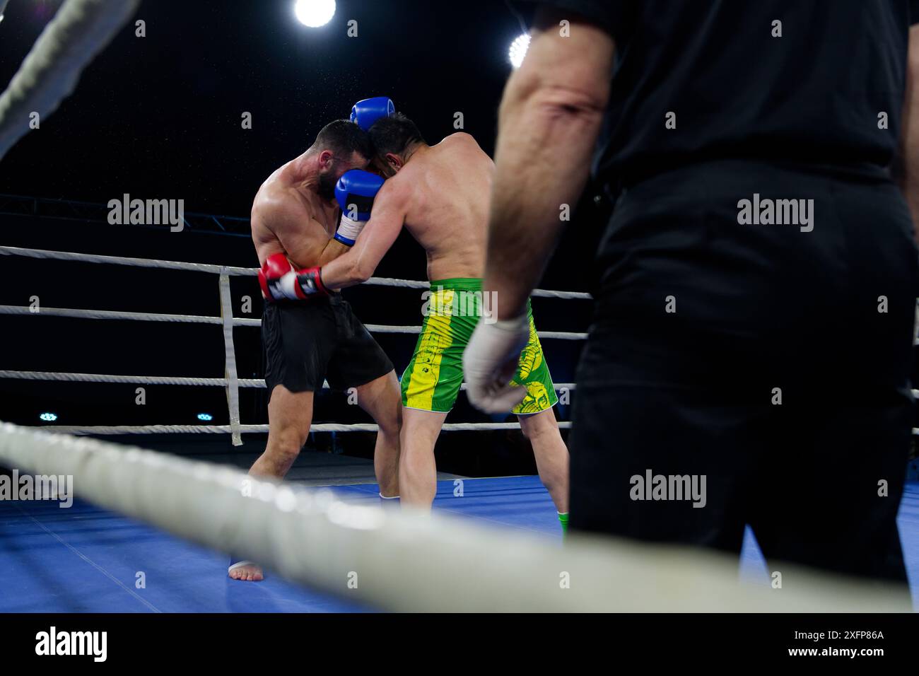 Fierce boxing match showcases athletes' power and skill Stock Photo - Alamy