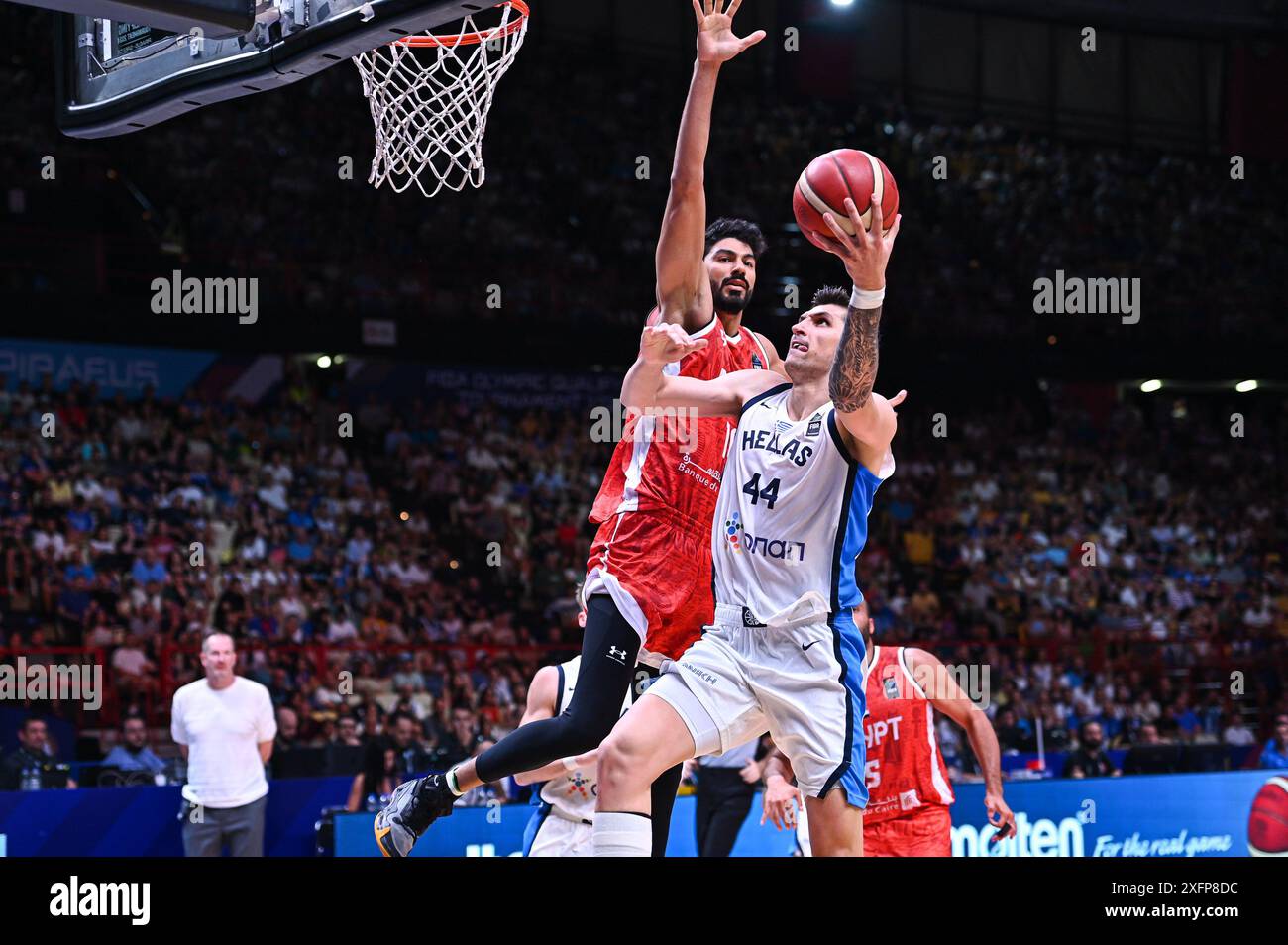 44 Dinos Mitoglou of Greece competing with 10 Anas Mahmoud of Egypt ...