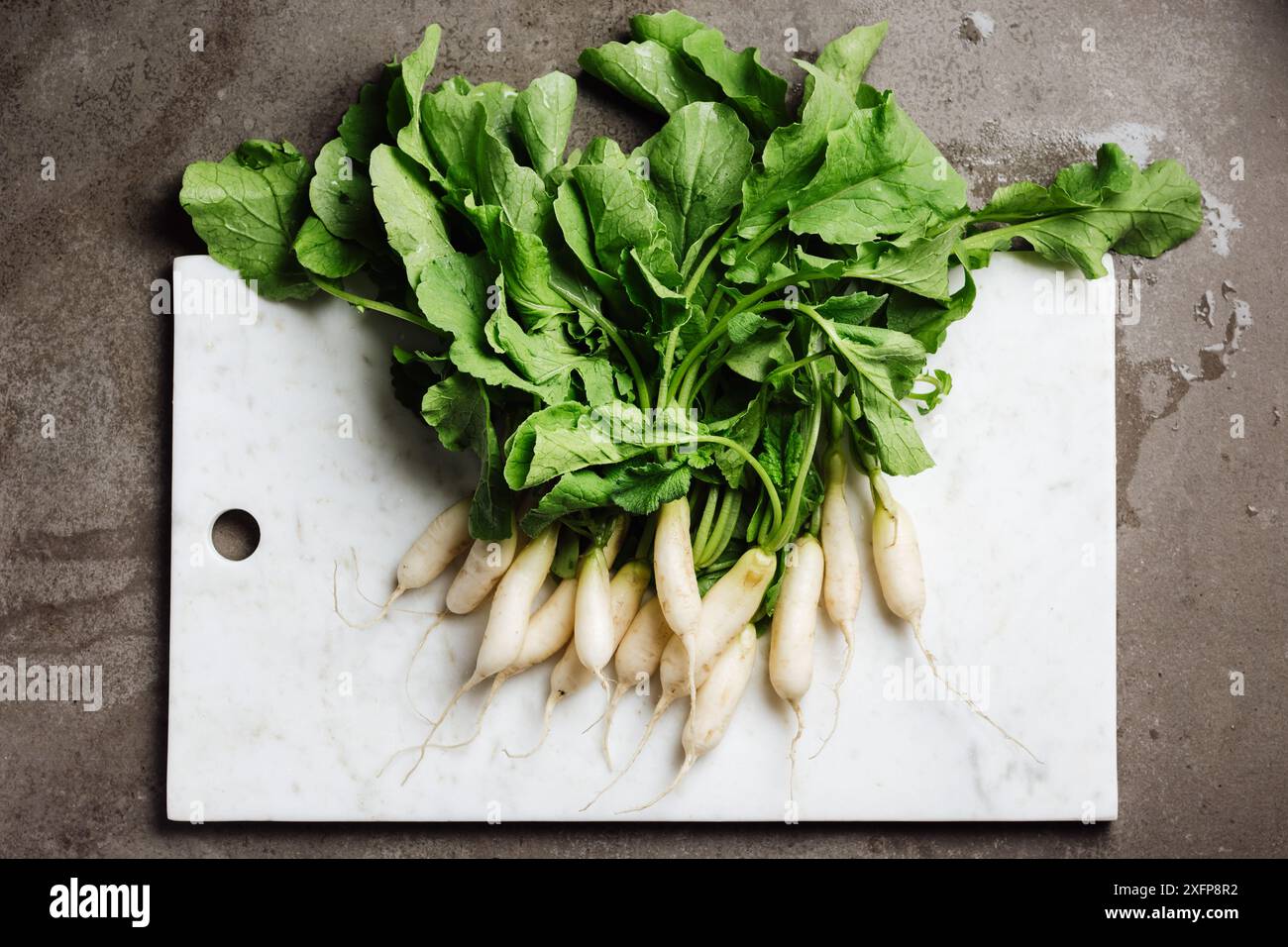 White long radish on marble background, top view Stock Photo - Alamy