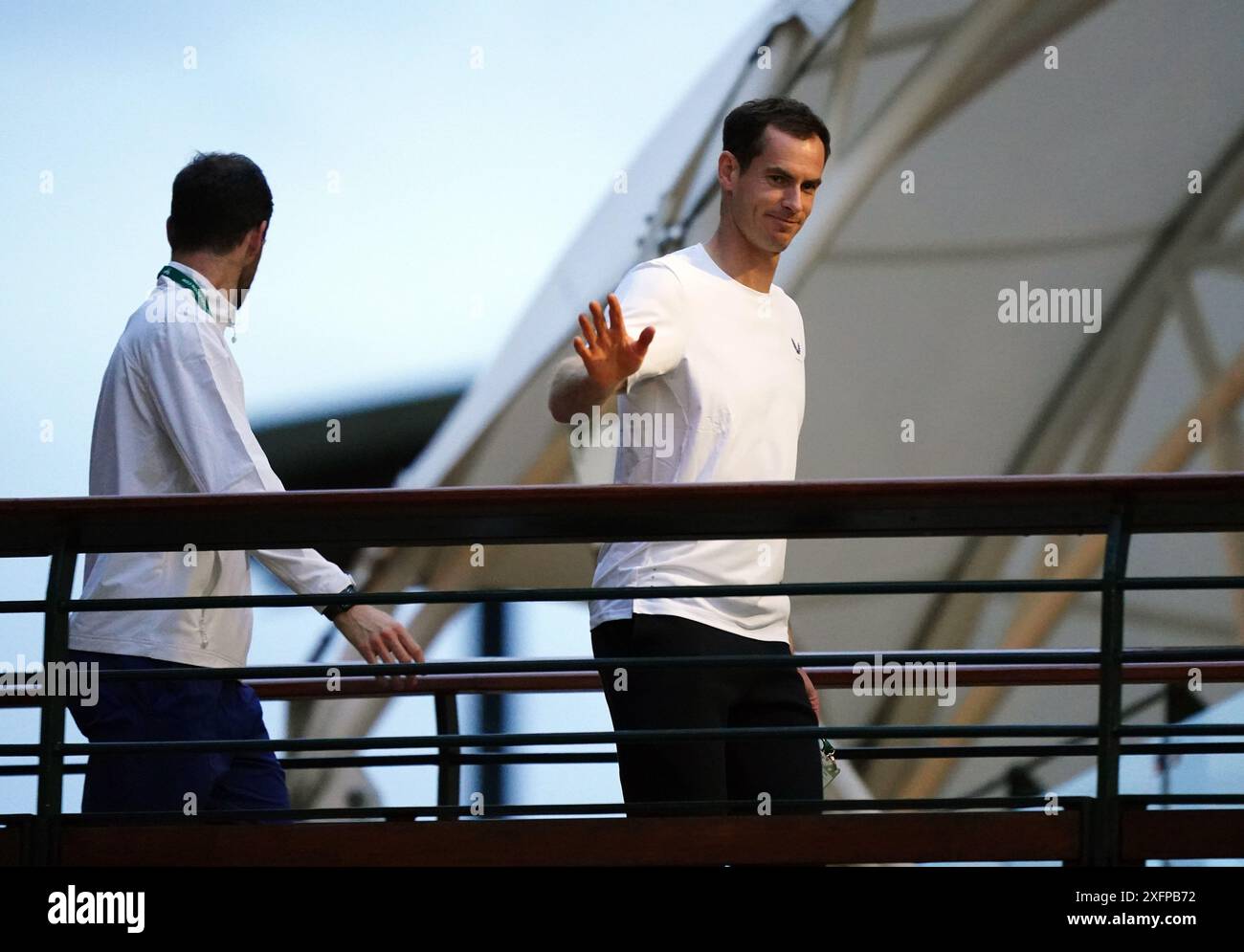 Andy Murray and Jamie Murray cross the players bridge on day four of ...
