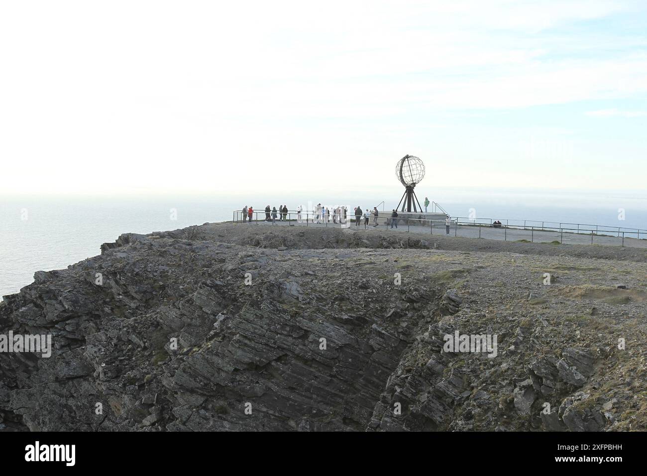 North Cape with steel globe and visitors, Lapland, Northern Norway ...
