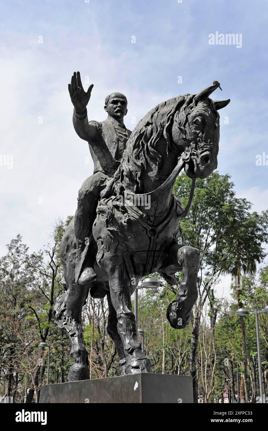 Mexico City, Mexico, Central America, An equestrian statue with a ...