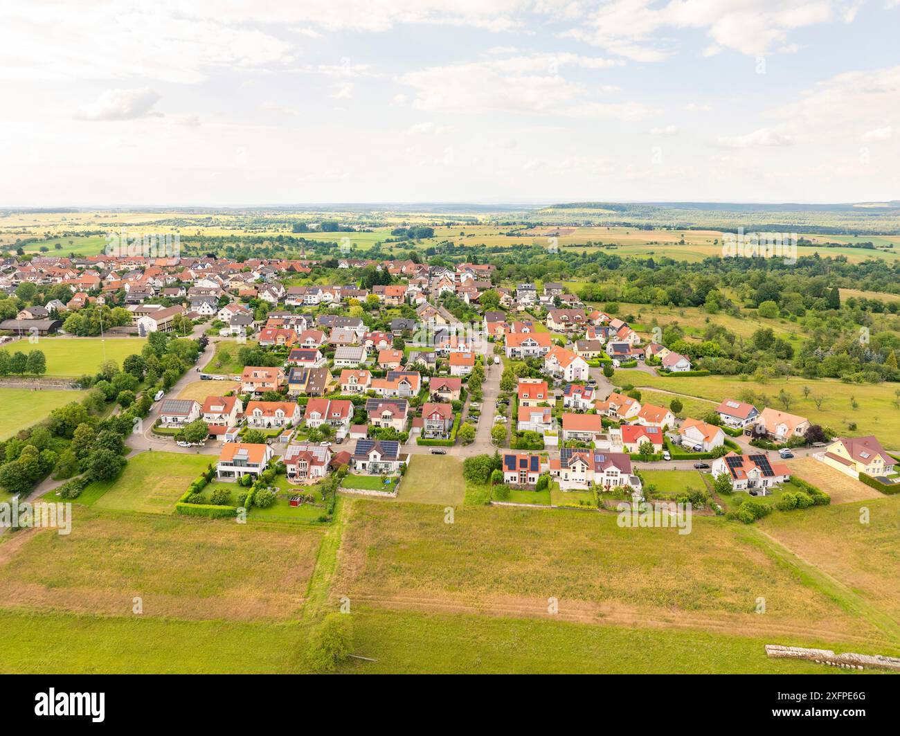 Town view with many houses in a residential area, surrounded by fields ...