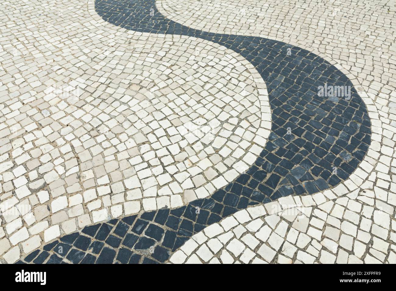 Traditional wave shaped pavement in Portugal Stock Photo - Alamy