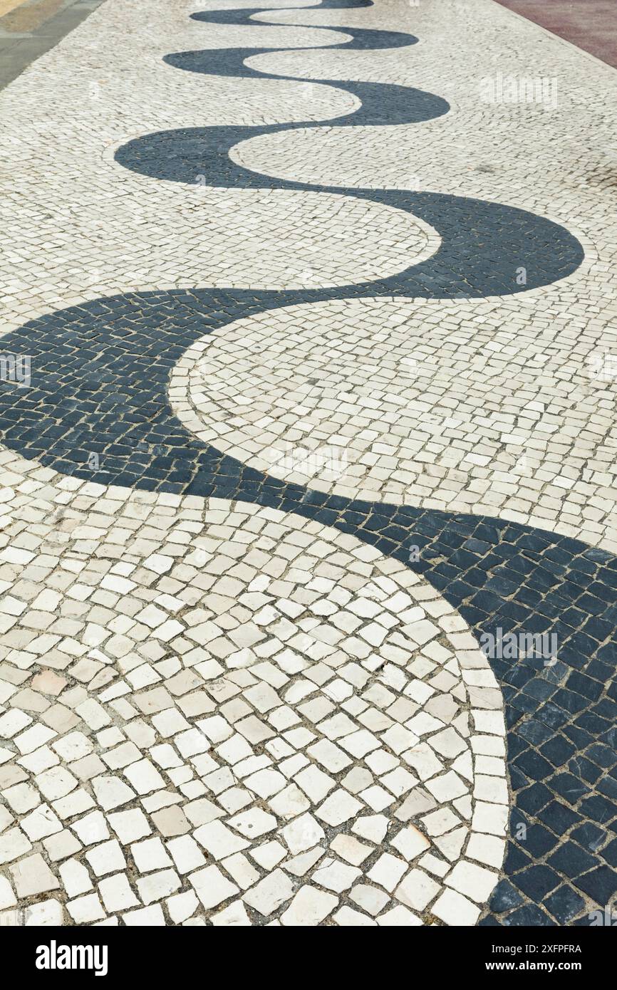 Traditional wave shaped pavement in Portugal Stock Photo - Alamy